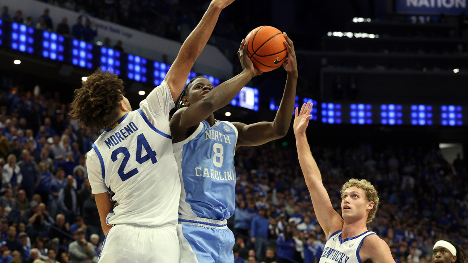 Derek Dixon delivers late as No. 16 North Carolina wins 67-64 at No. 18 ...