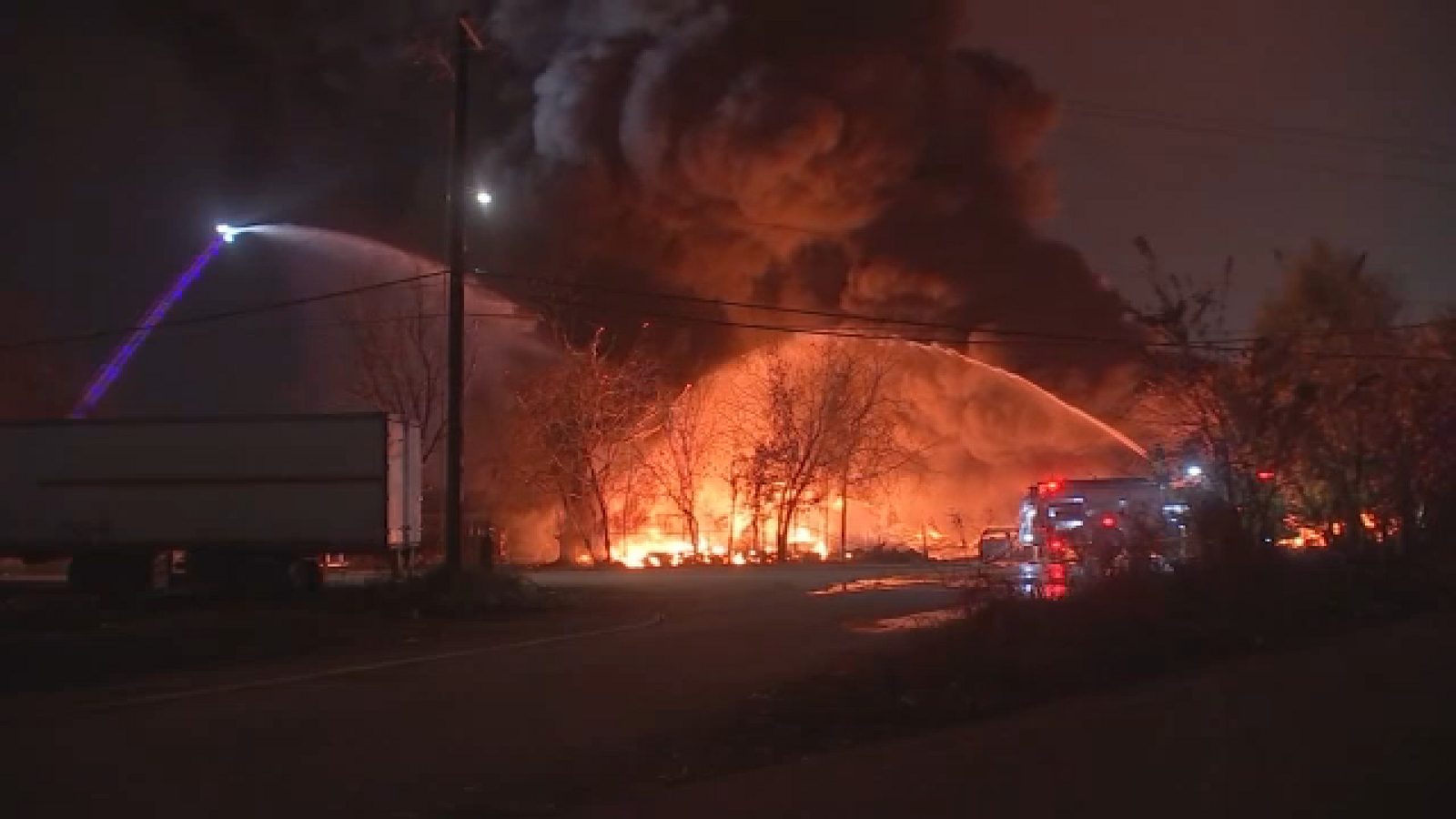 No injuries after massive fire at tire resale shop off Liberty Road in ...