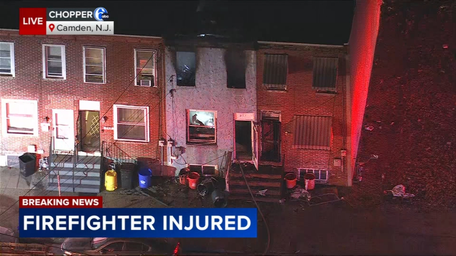 Firefighter injured while battling blaze inside row home in Camden, New ...