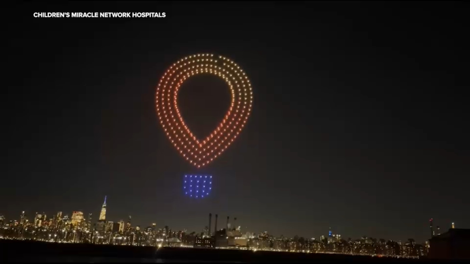 Drones put on light display over East River to raise awareness for ...