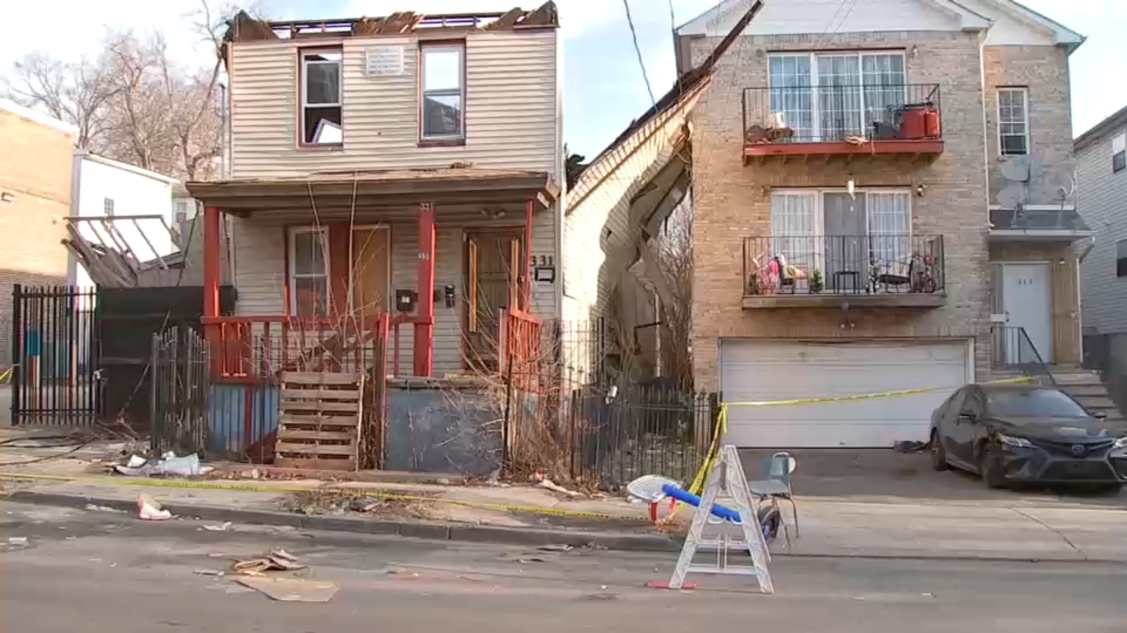 Vacant house collapses in Newark, NJ, leaving wall leaning on neighbor ...