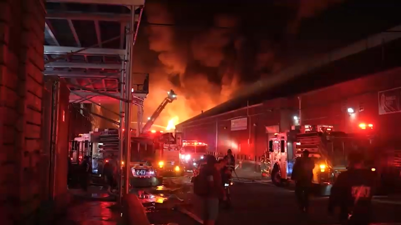 2 injured as massive Universal Food Distributors warehouse fire darkens ...