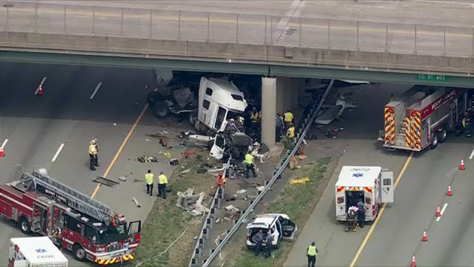 Tractor-trailer strikes overpass support beams on I-295 in Mt. Laurel ...