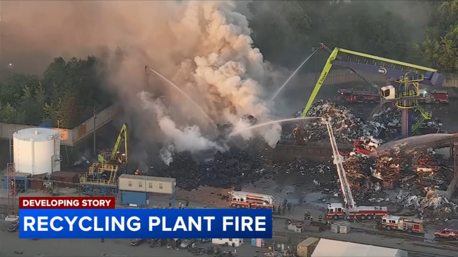 Large junkyard fire in Camden, New Jersey, at EMR Recycling plant at ...