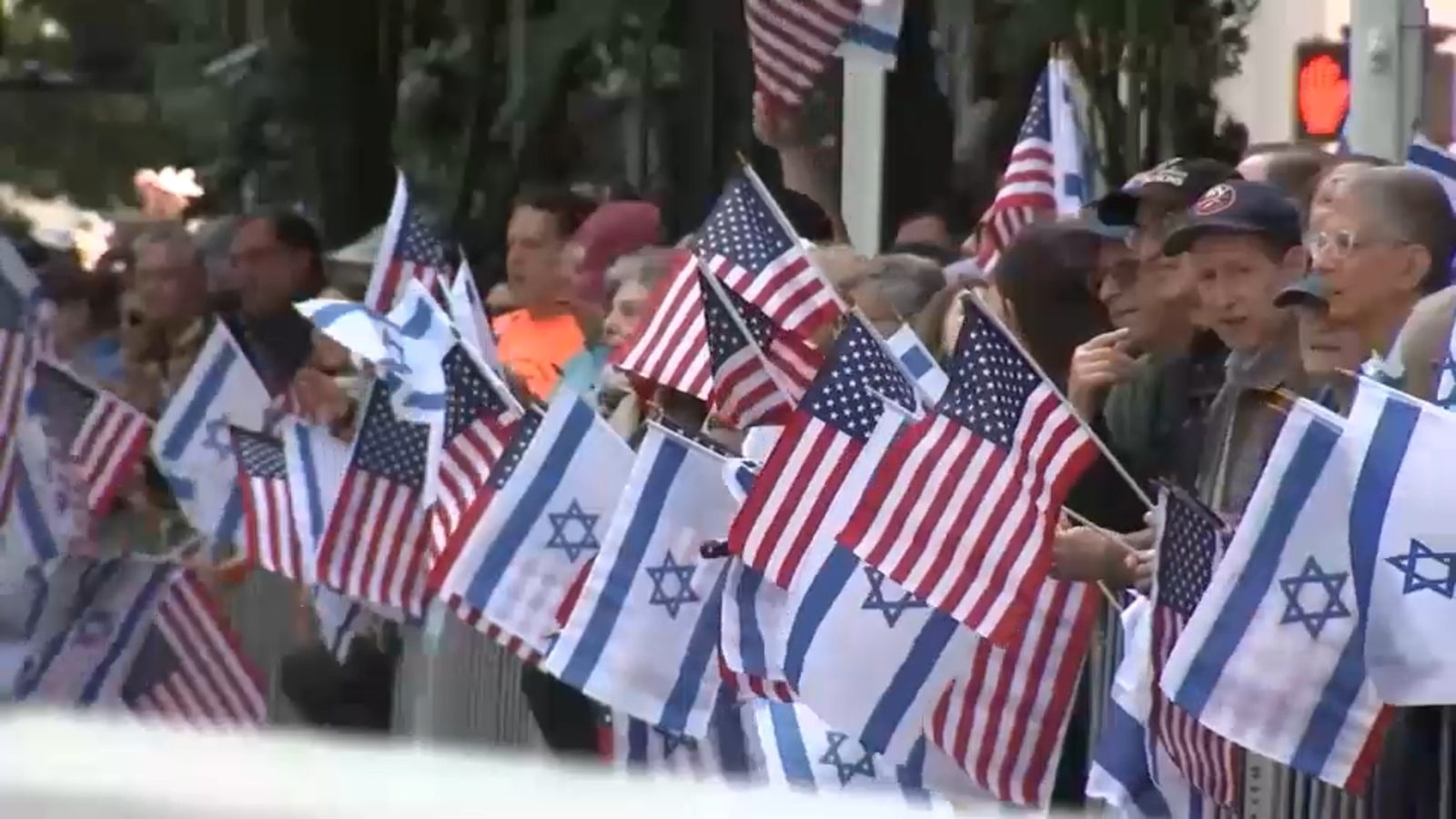 Spectators gather for Israel Day Parade along Fifth Avenue - ABC7 New York