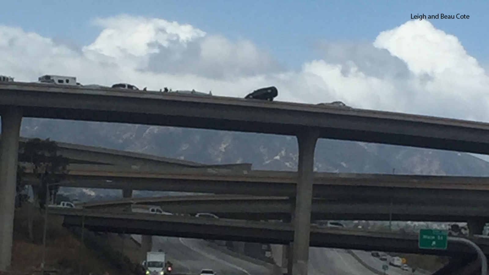 Corona scene cleared after car dangles over side of freeway connector ...