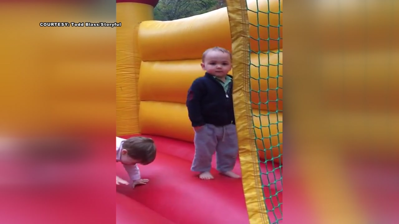 Toddler nonchalantly bounces in inflated bounce house - ABC13 Houston