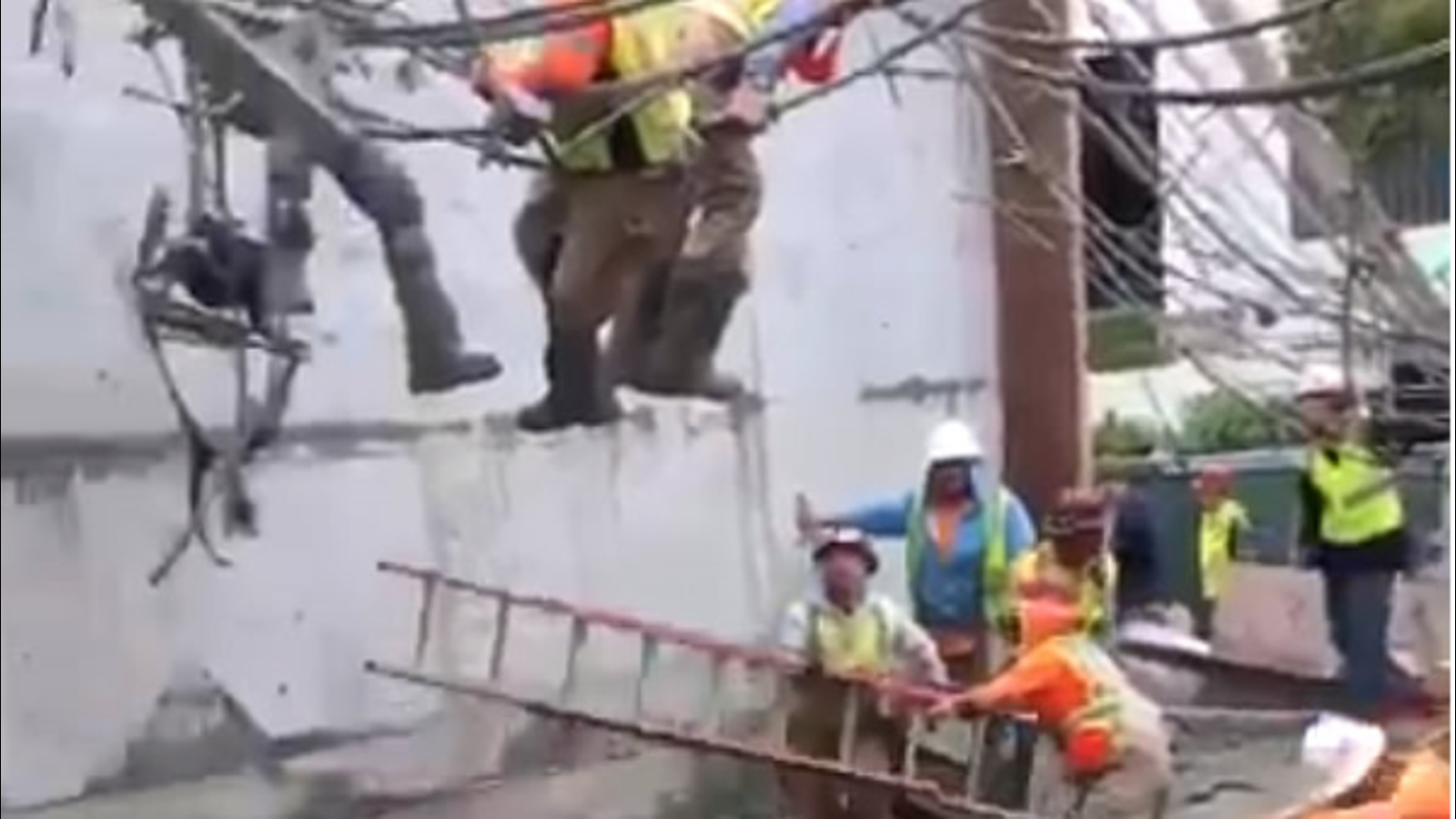 EXCLUSIVE VIDEO: Construction workers dangle from collapsed Oakland ...