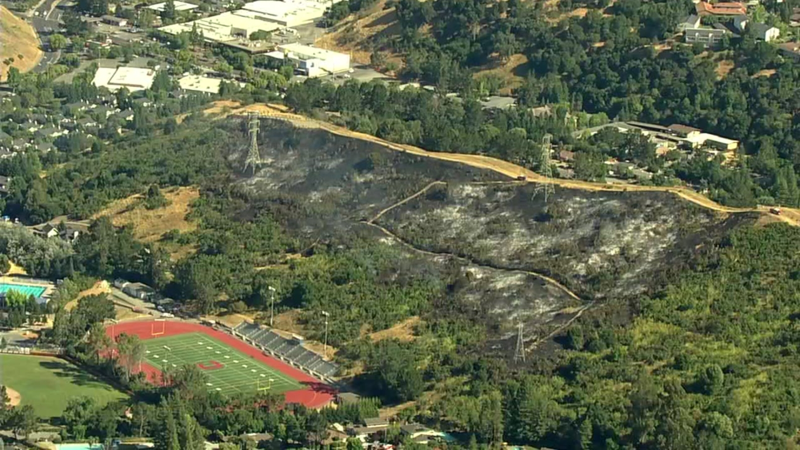 Fire crews put out 4-alarm grass fire threatening homes near Moraga ...