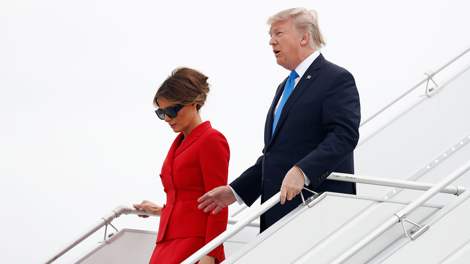 Presidents Donald Trump, Emmanuel Macron look past differences on Paris ...