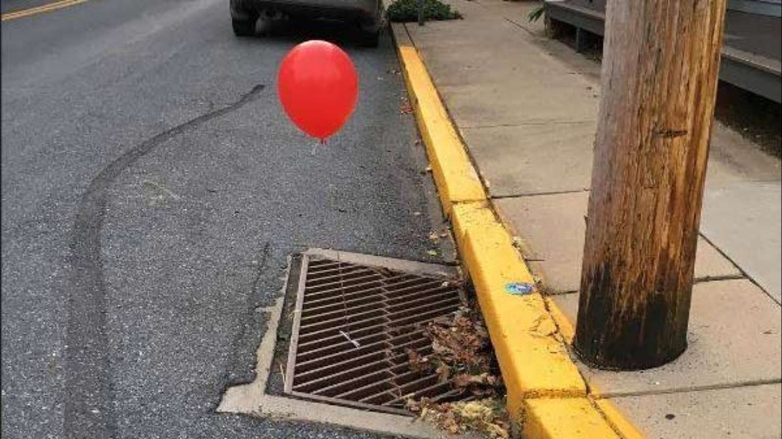 Teen takes credit for red 'It' balloons tied to sewer grates in ...