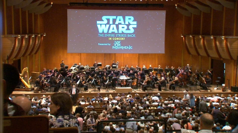Orchestra performs 'Star Wars' music live during movie showing at ...