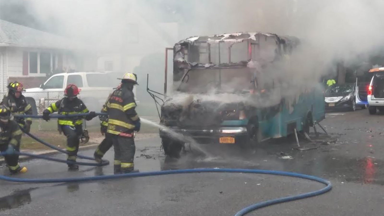 Driver evacuates special needs adults before bus goes up in flames on ...