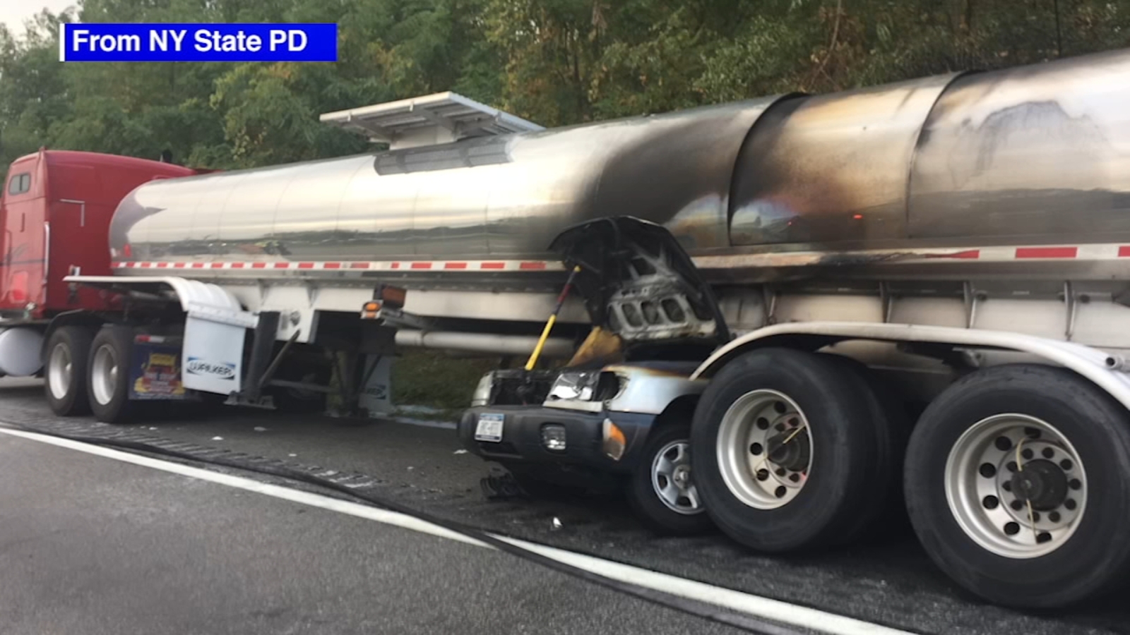 Strangers rush in to save couple trapped under burning tanker on Route ...