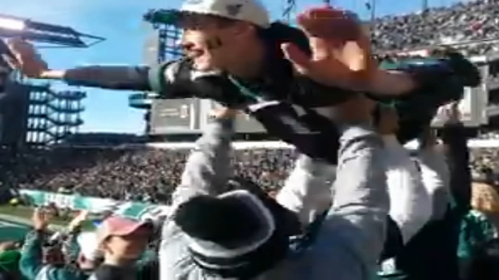 Philadelphia Eagles fans hoist teen in the air to celebrate his first ...