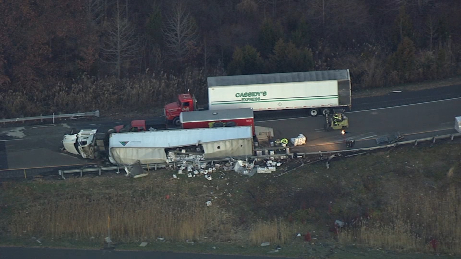 Truck carrying vodka bottles overturns on I-95 ramp in Pennsylvania ...