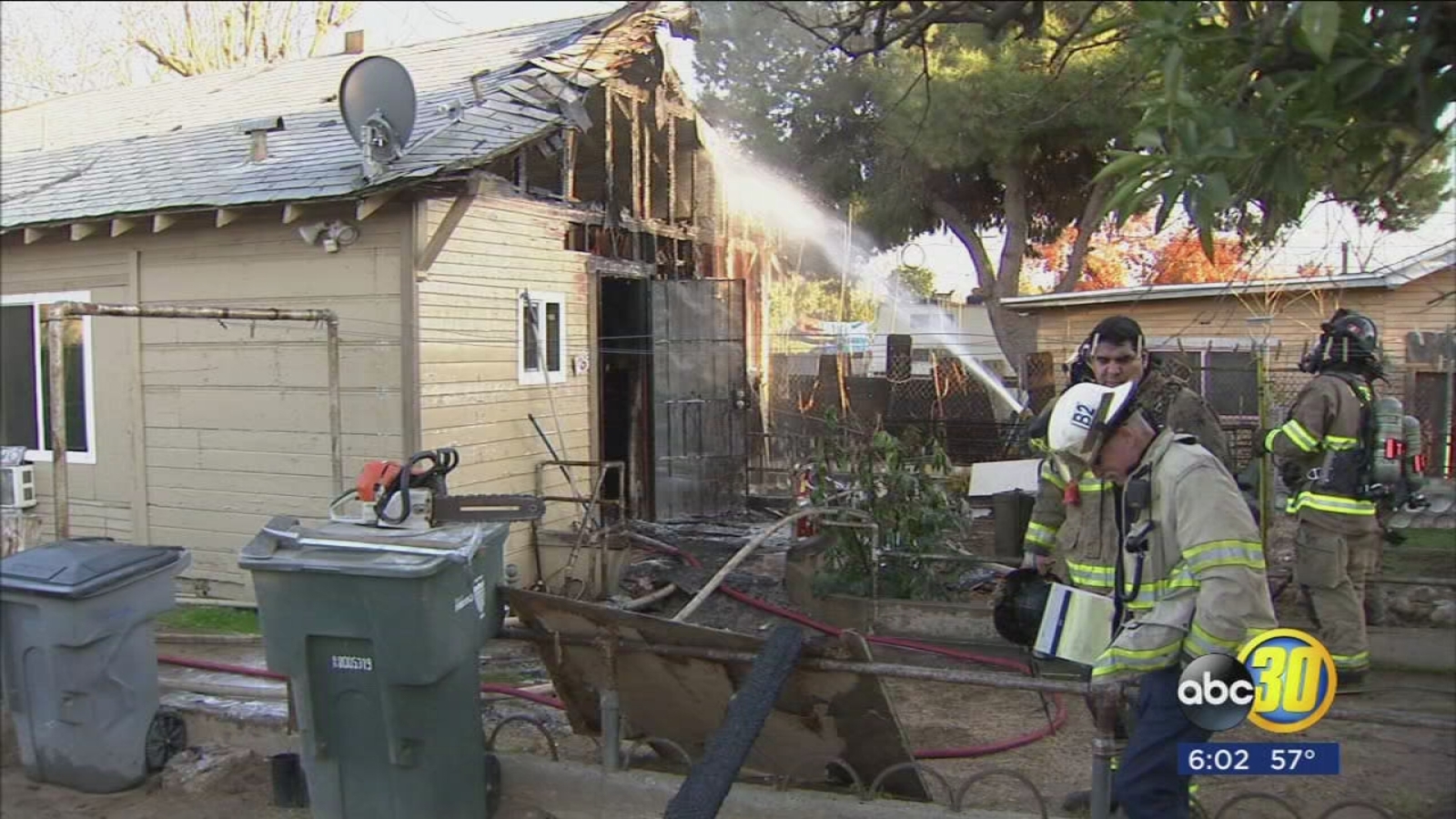 Woman hospitalized after building catches fire in Southwest Fresno - ABC30 Fresno