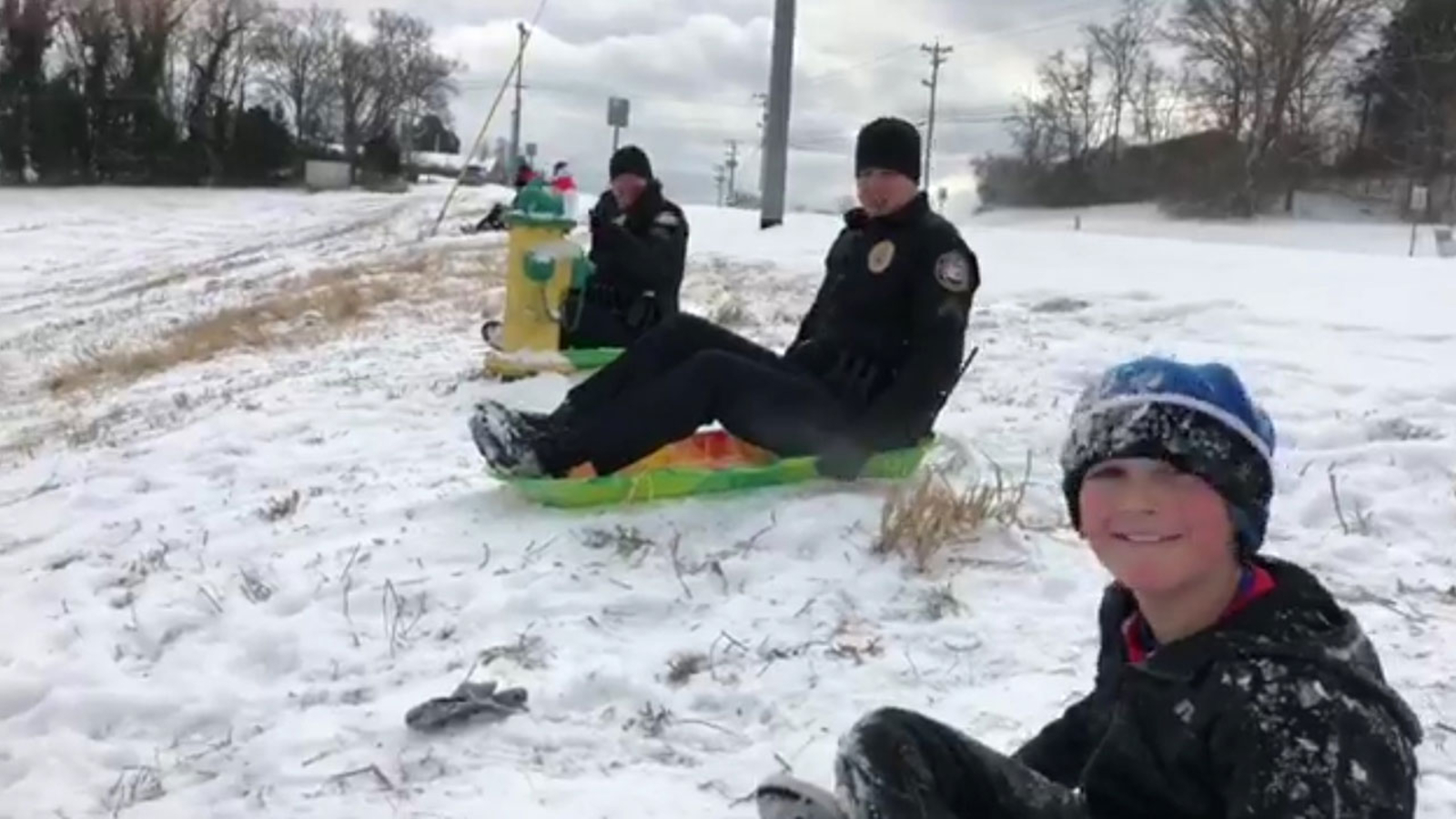 Snow day fun: Police challenge kid to sledding race - ABC7 New York