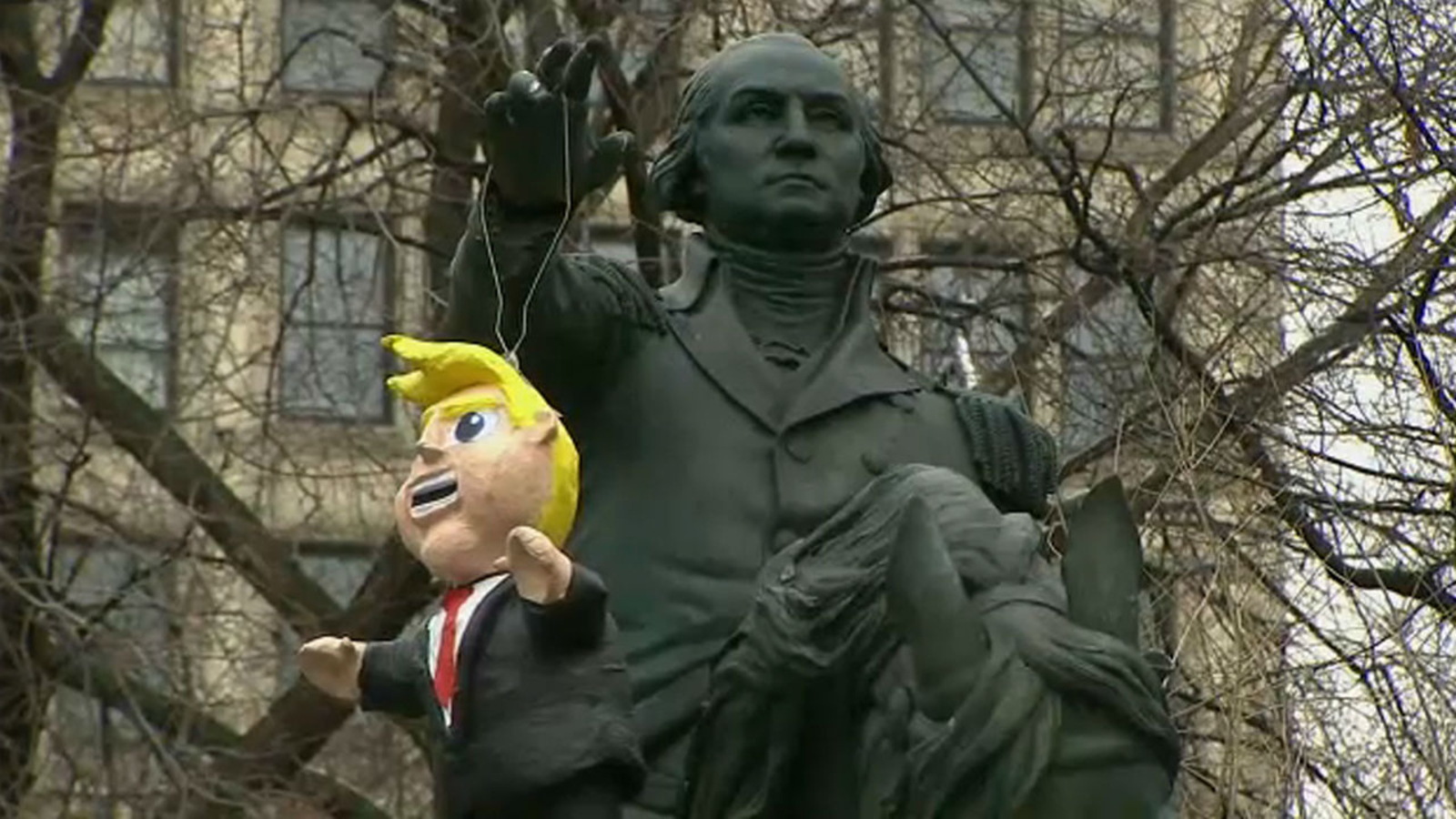 Protester hangs piñata of President Trump in Union Square ahead of ...