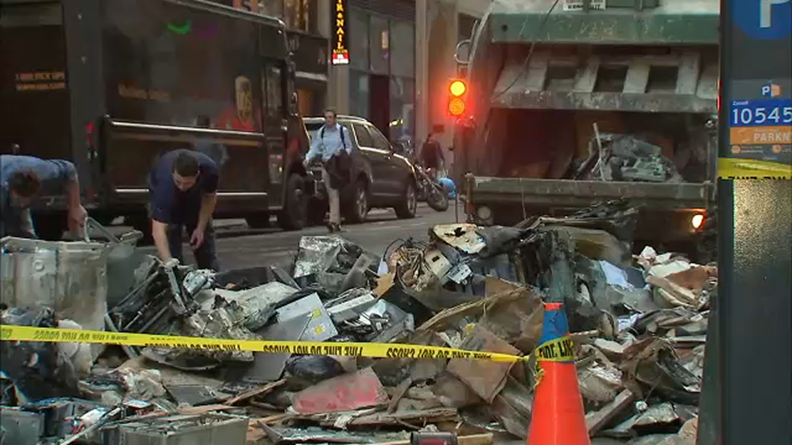 2 workers hurt when fire breaks out in sanitation truck in Midtown ...