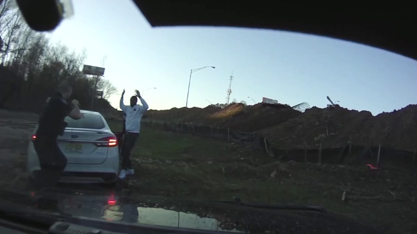 Police: Suspect takes off with officer in car during traffic stop in ...