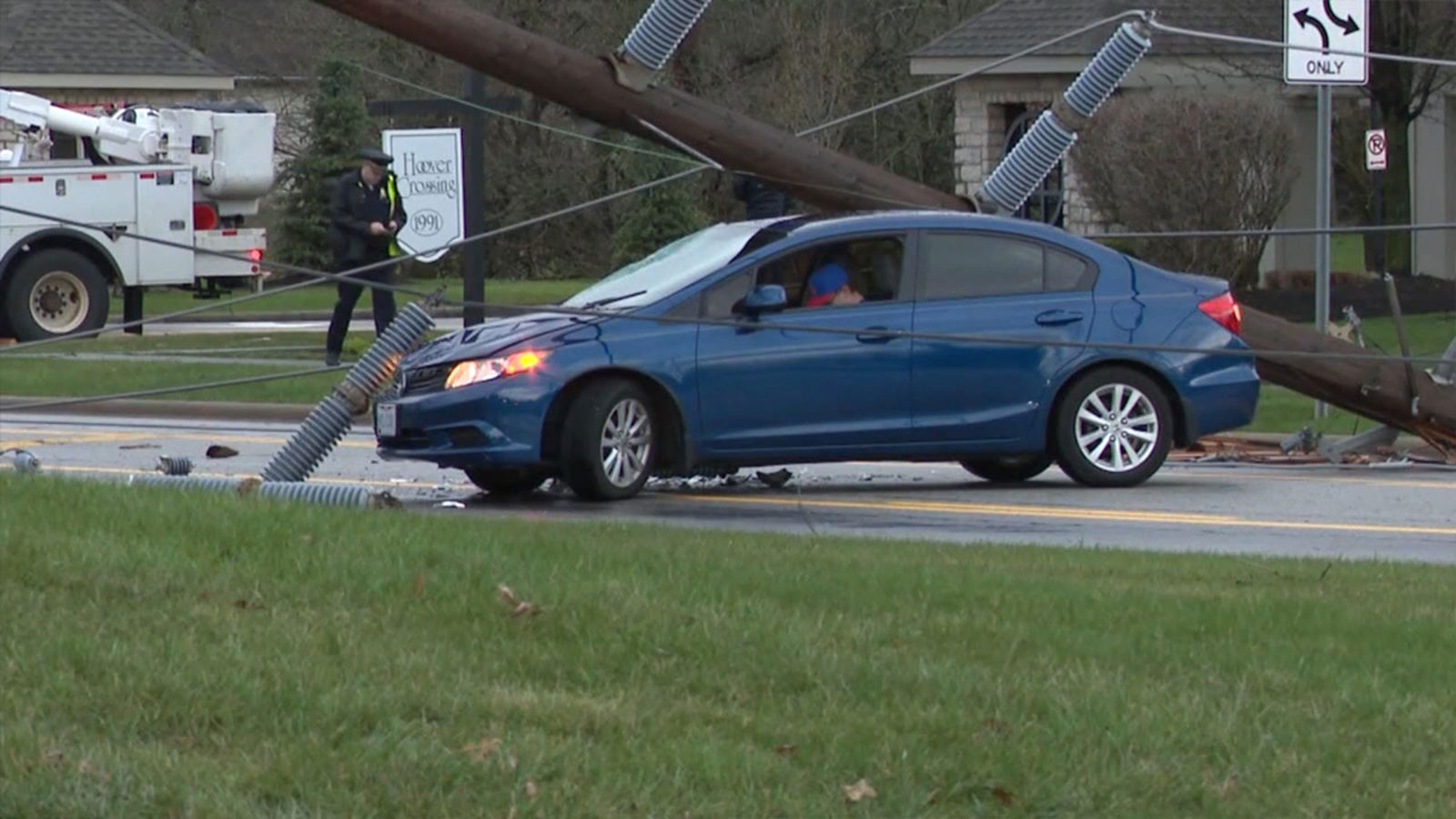 Teen trapped in car under power line for hours stays put as crews ...