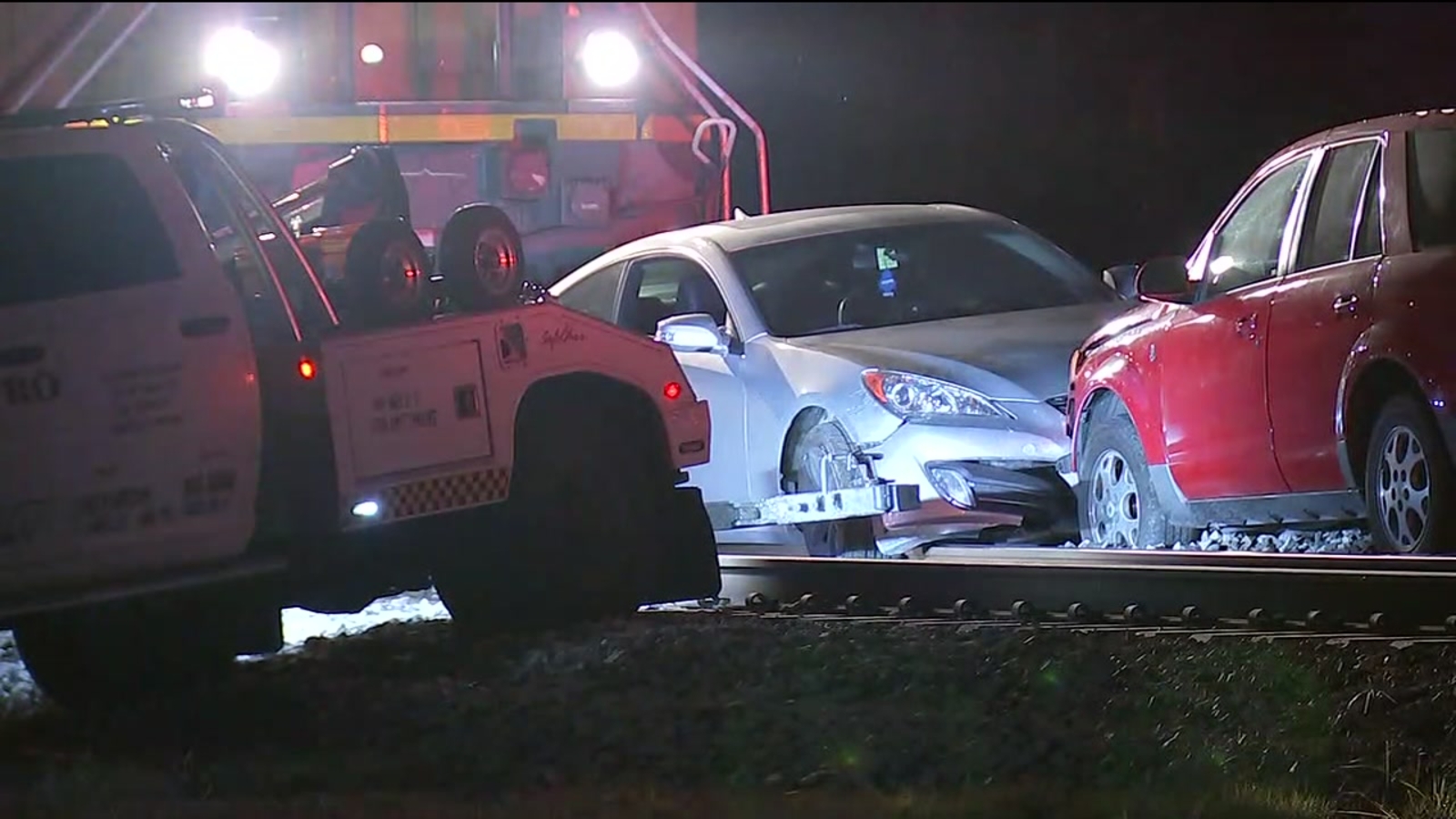 Train smashes into vehicles police say were intentionally left on ...