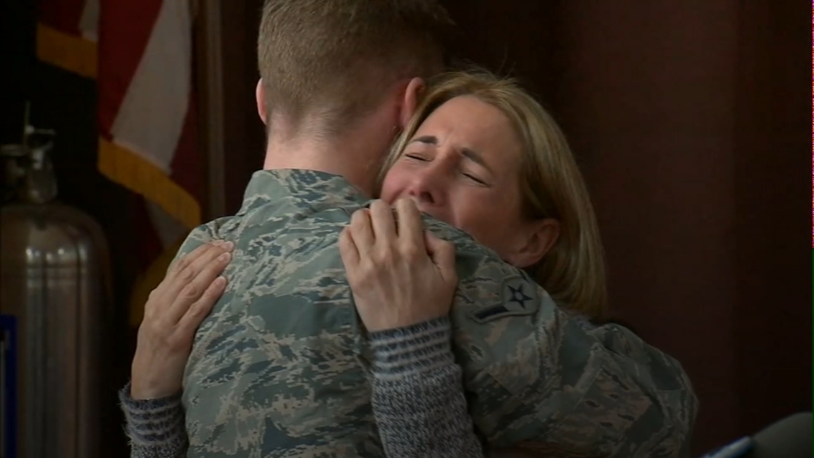 Deployed airman surprises teacher mom during school assembly on Long ...