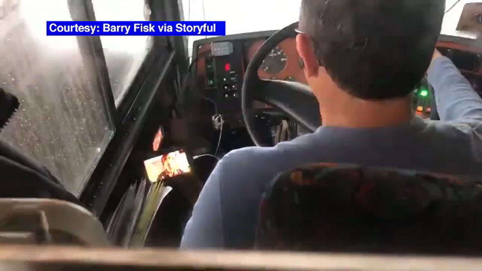 New York bus driver caught on camera watching videos while driving ...