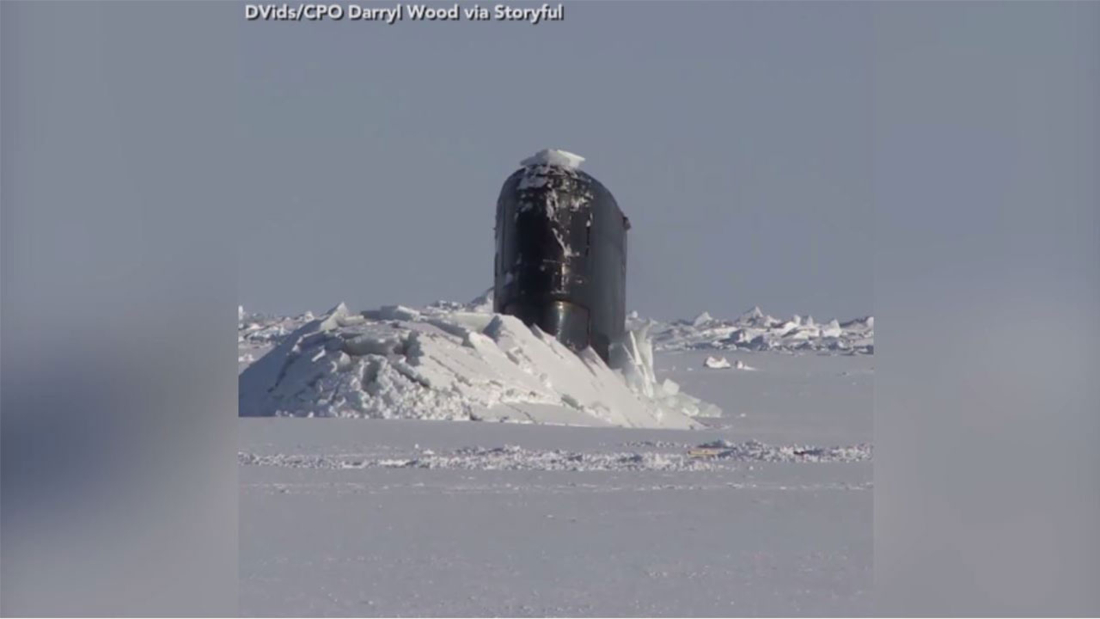 Royal Navy submarine breaks through thick ice during training exercise ...