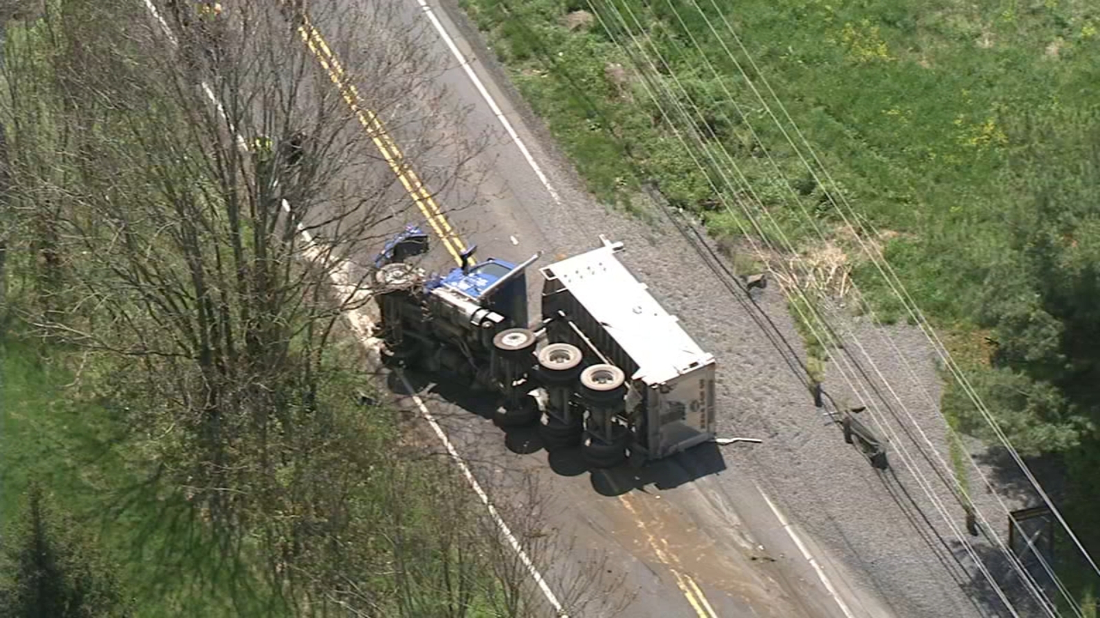 Dump truck flips on its side in Newtown Twp., Bucks Co. crash - 6abc ...