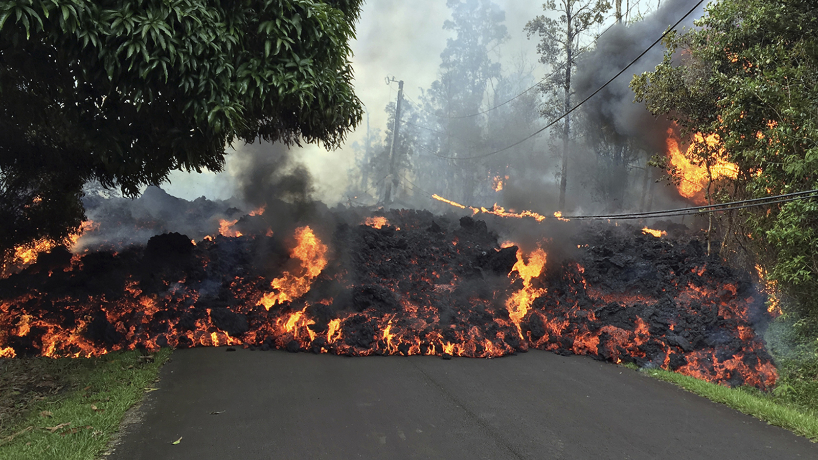 Lava flows: How communities near an active volcano clean up and recover ...