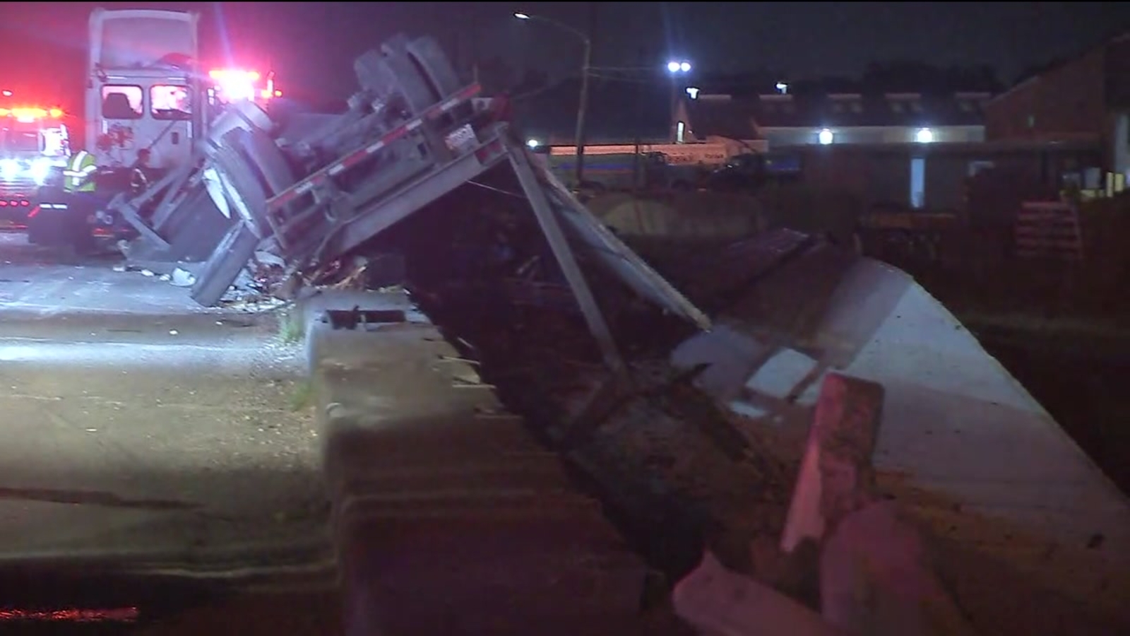 Overturned 18-wheeler spills fruit into Hunting Bayou along North Loop ...