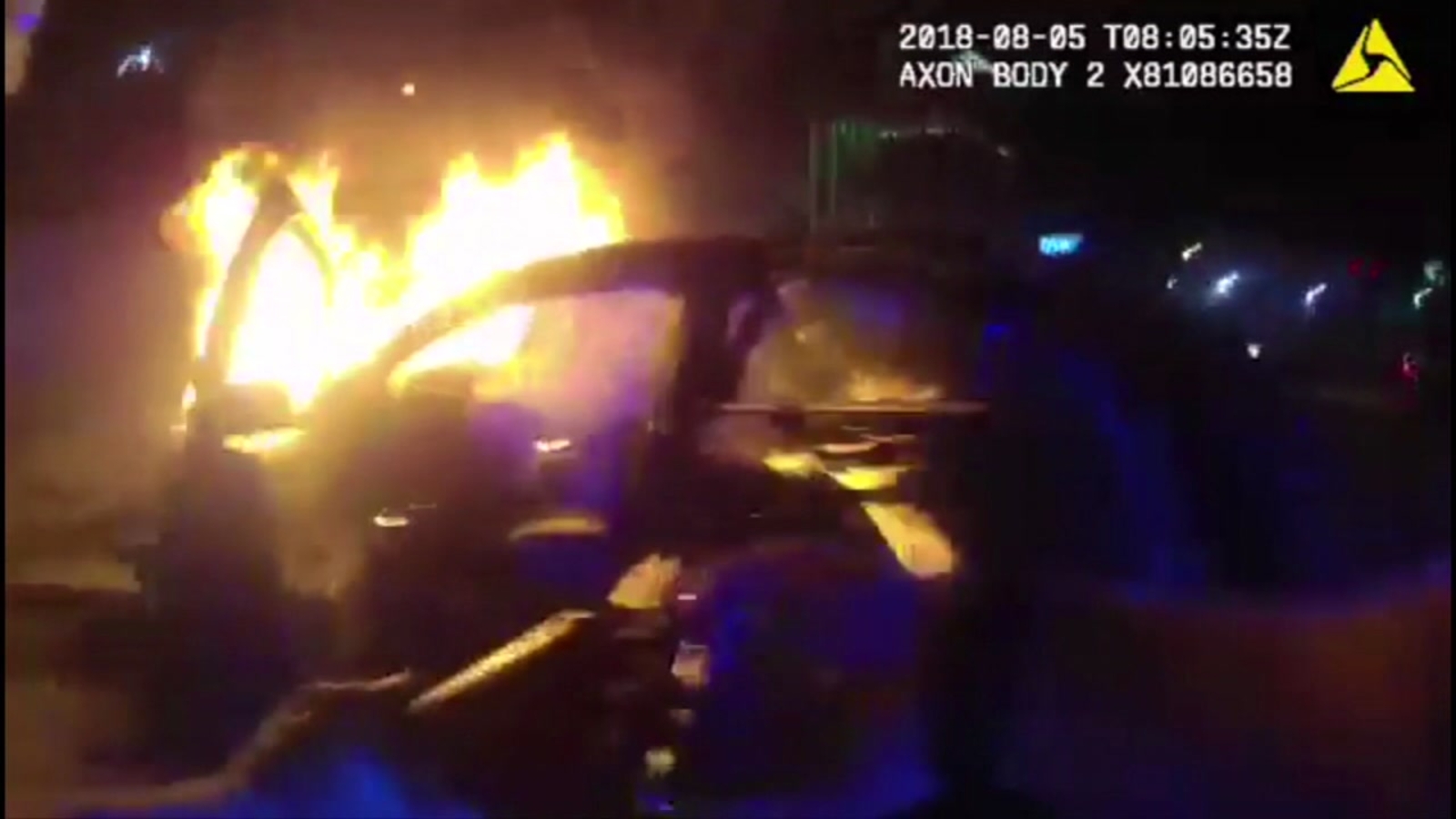 CAUGHT ON CAMERA: Police jump to rescue passenger of fiery crash ...