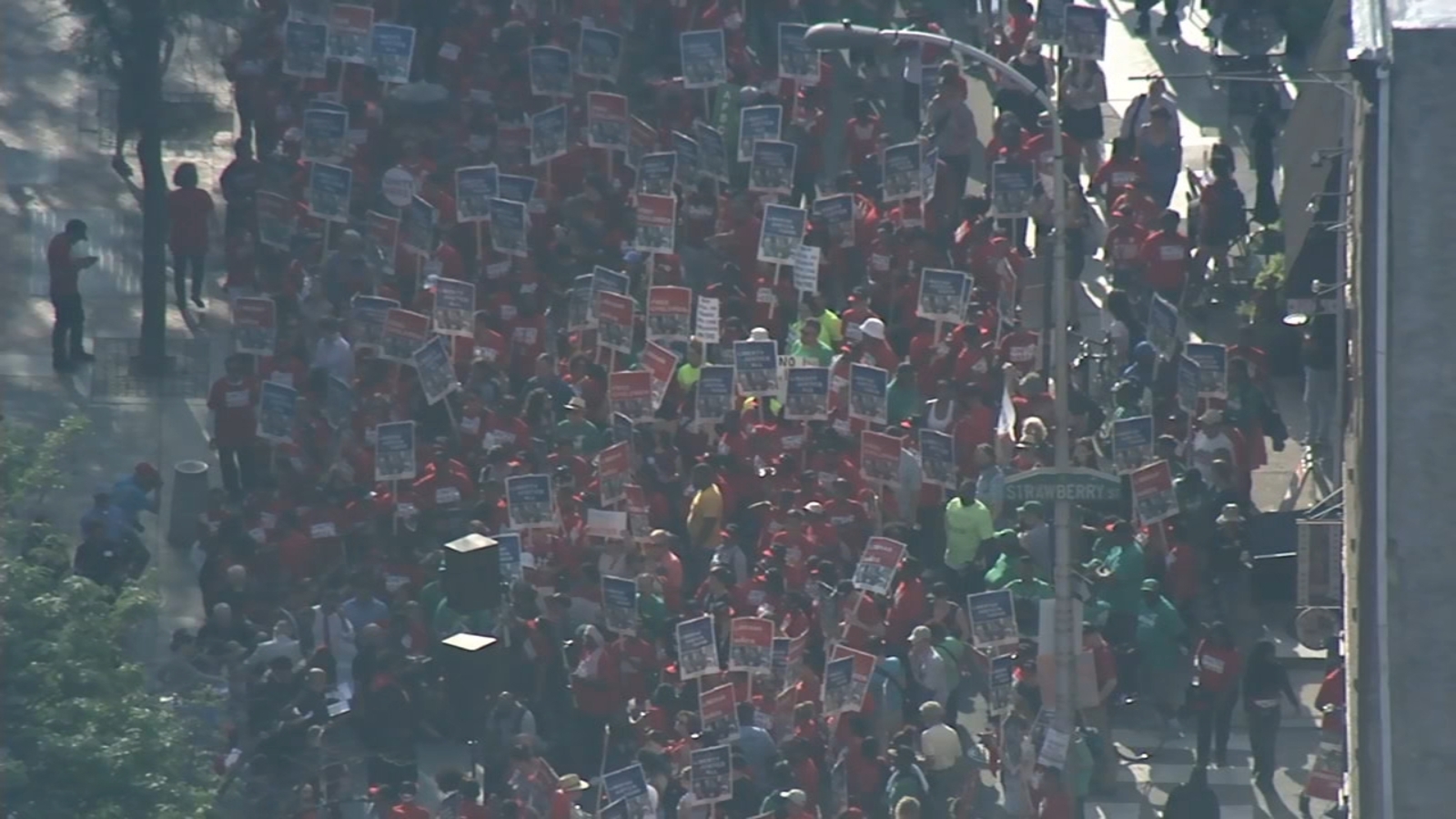 Union workers march in support of immigrant rights in Center City ...