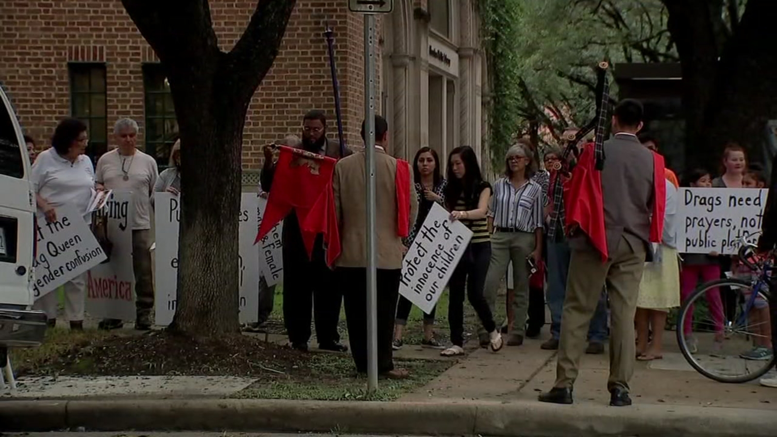 Protesters gather during Houston public library's drag queen story time ...