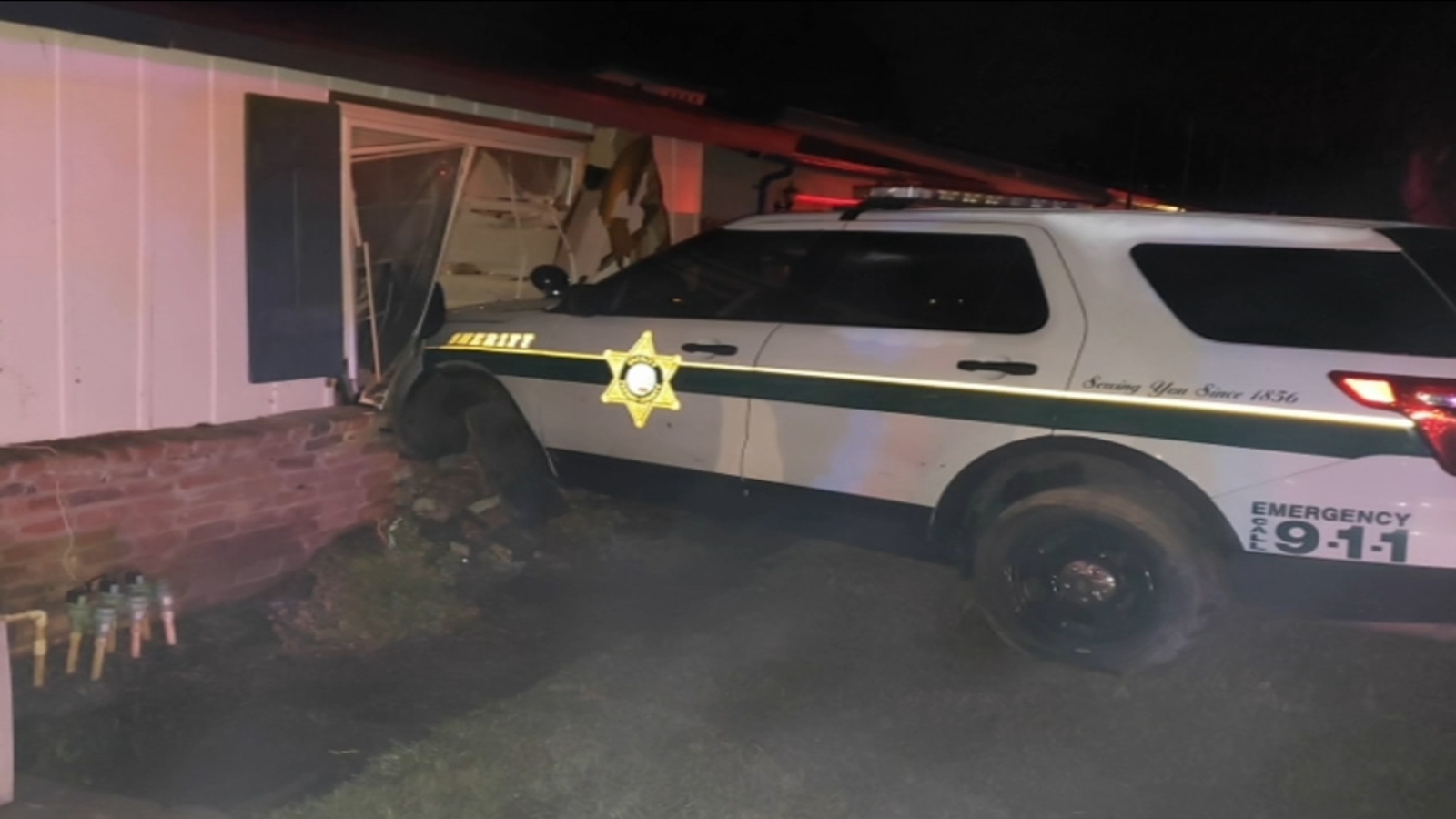 Sheriff's deputy's car crashes through bedroom window, missing woman by ...