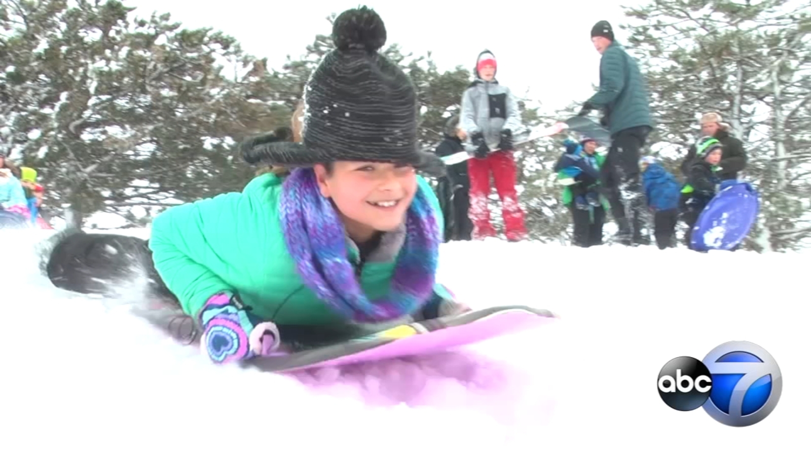 Snow day fun: Kids fly down Lisle sledding hill - ABC7 Chicago