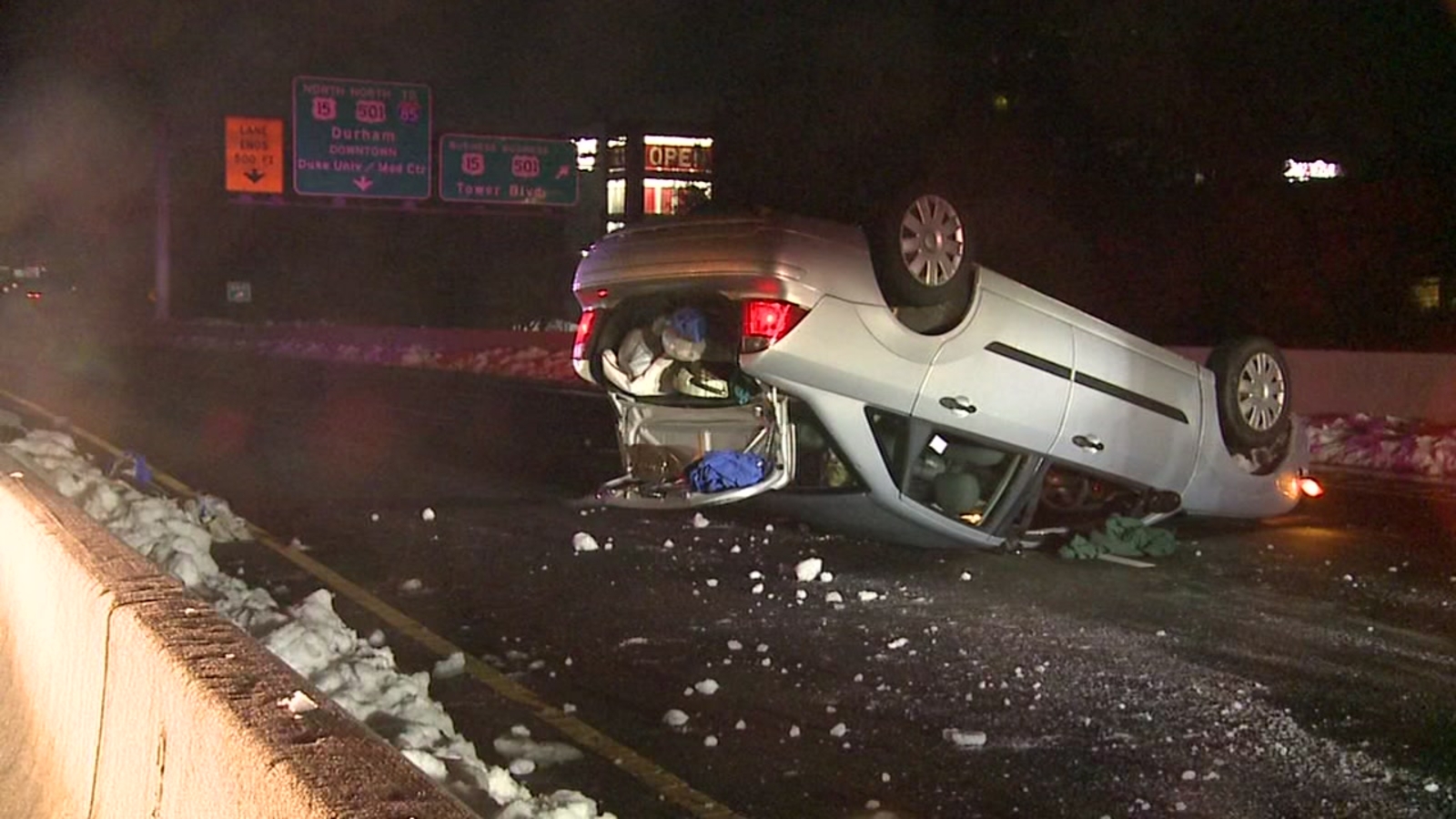 'Huge sheet of ice:' Man hits black ice, flips car on Durham bridge ...