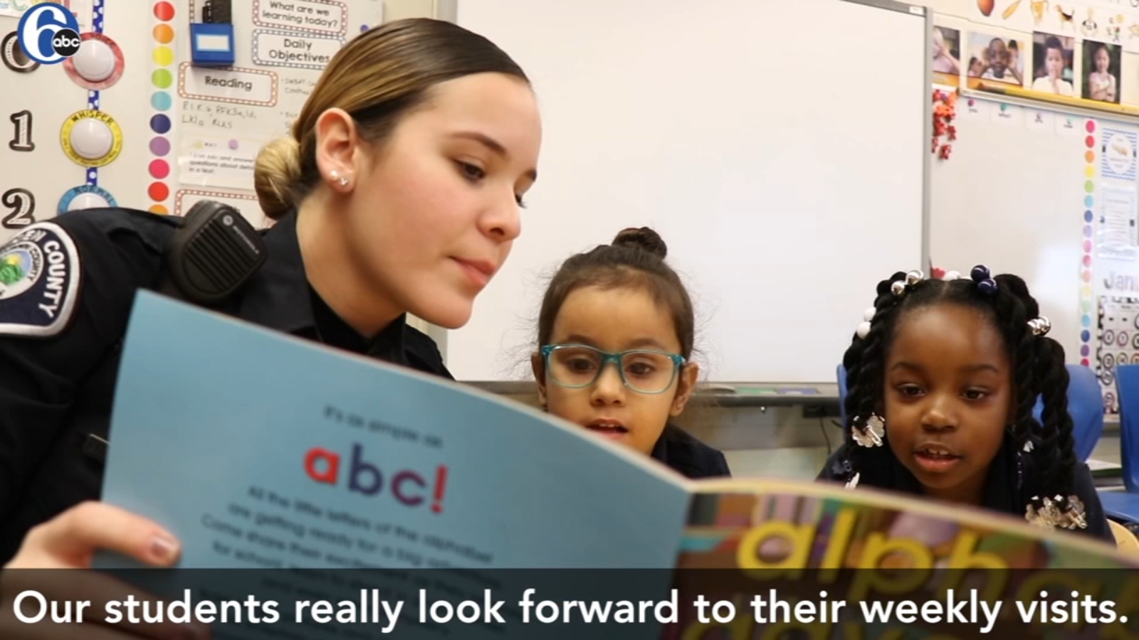 Cops and kindergartners: Officers on duty read to Camden kids - 6abc ...