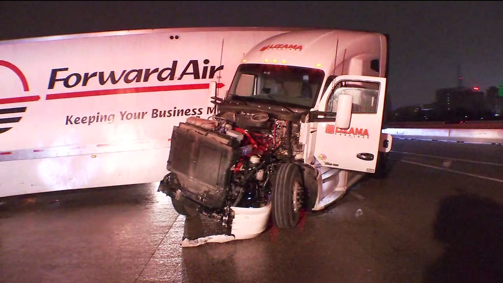 Slick roads could be to blame for jackknifed semi crash on East Freeway ...