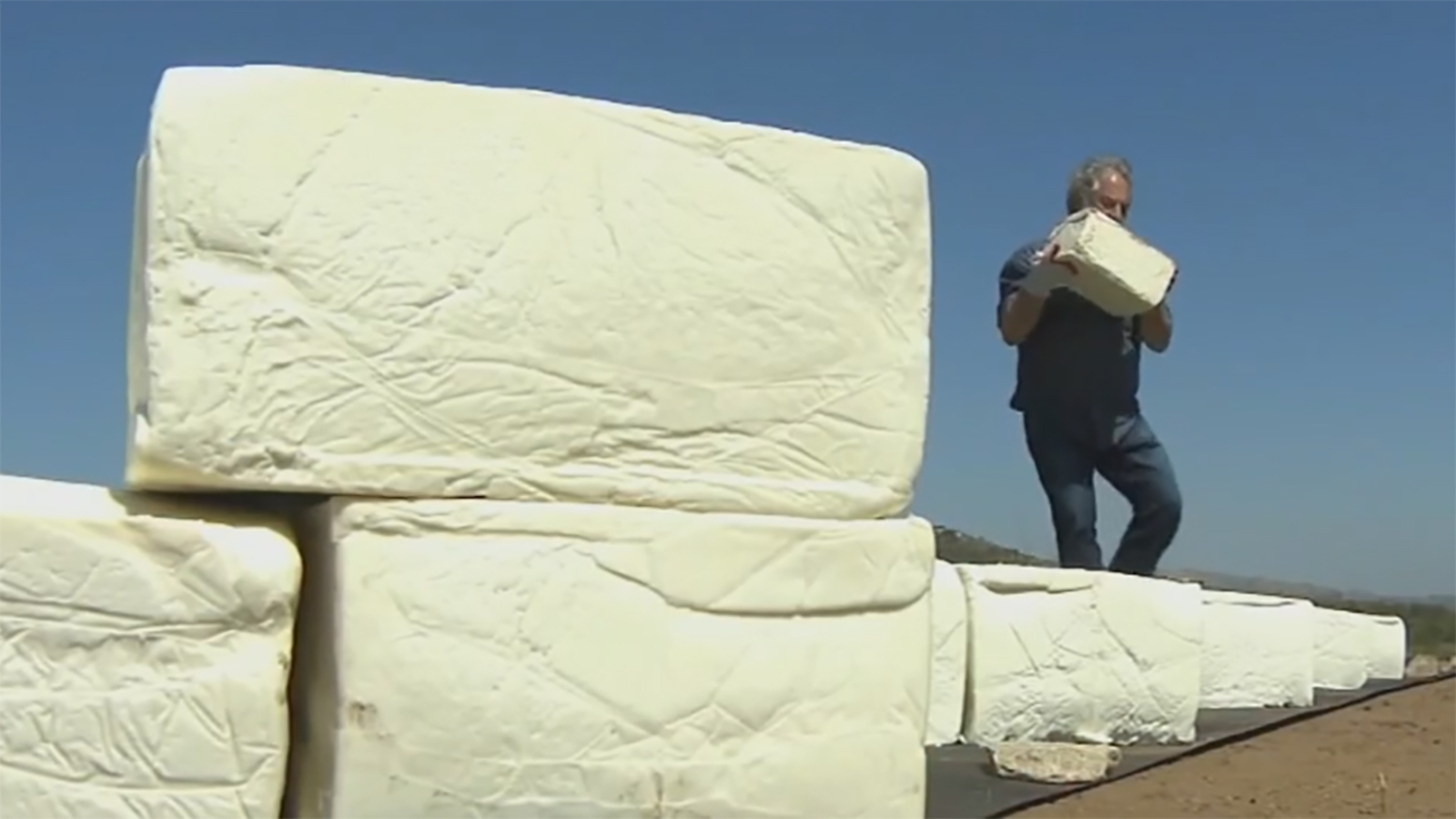 Mexican cheese wall going up at US-Mexico border by California artist ...