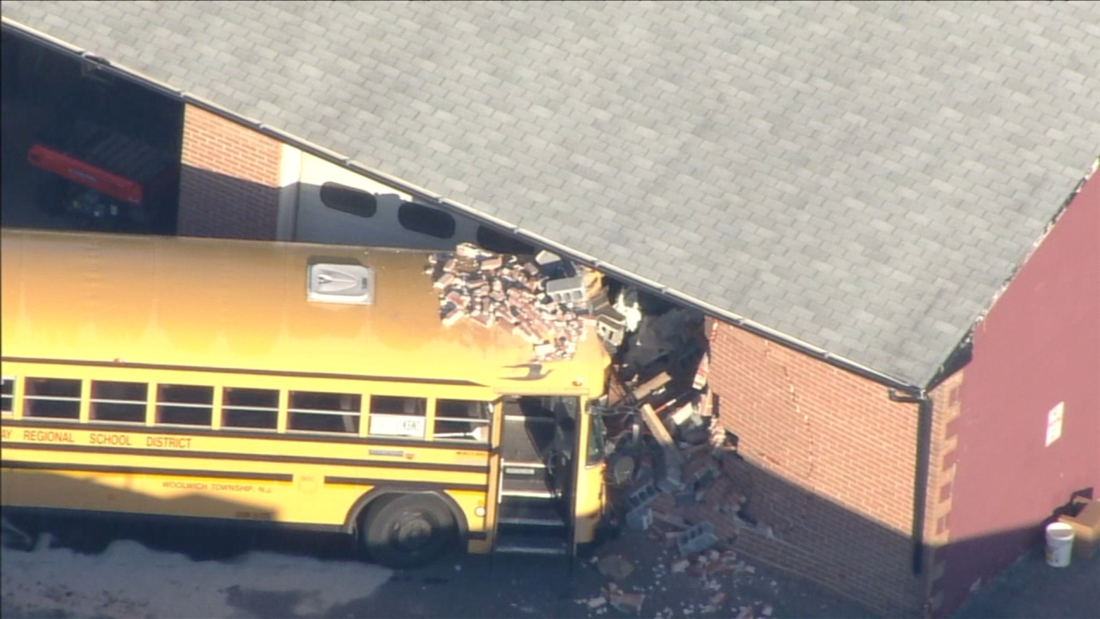School bus driver crashes into garage near Kingsway Regional High ...