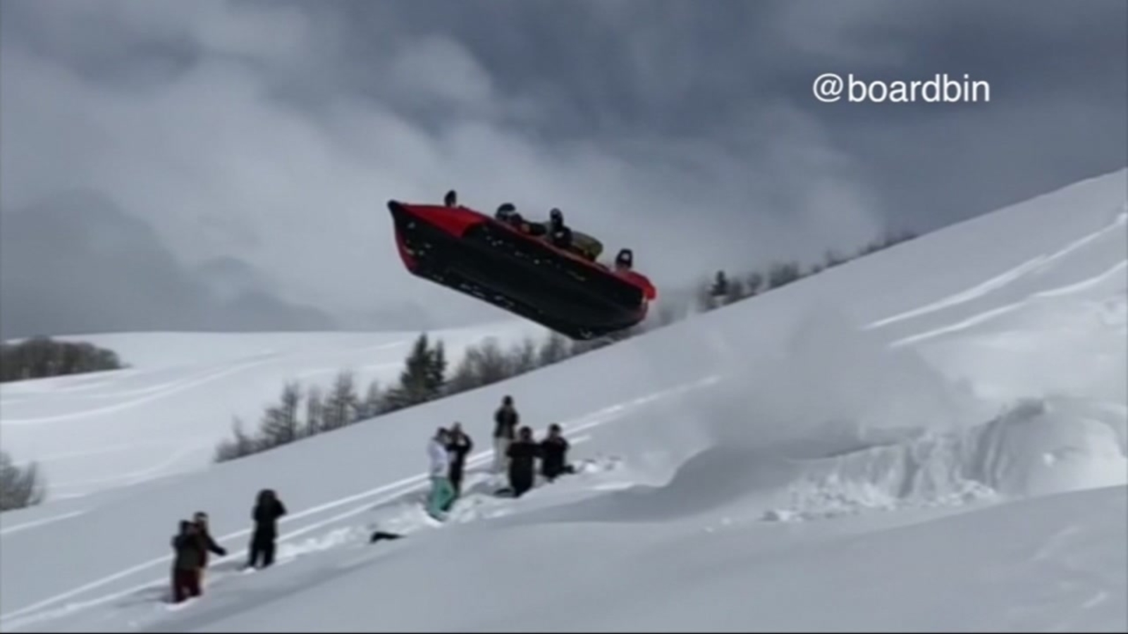 VIDEO: Dare devils catch close to 100 feet of air while skiing down ...