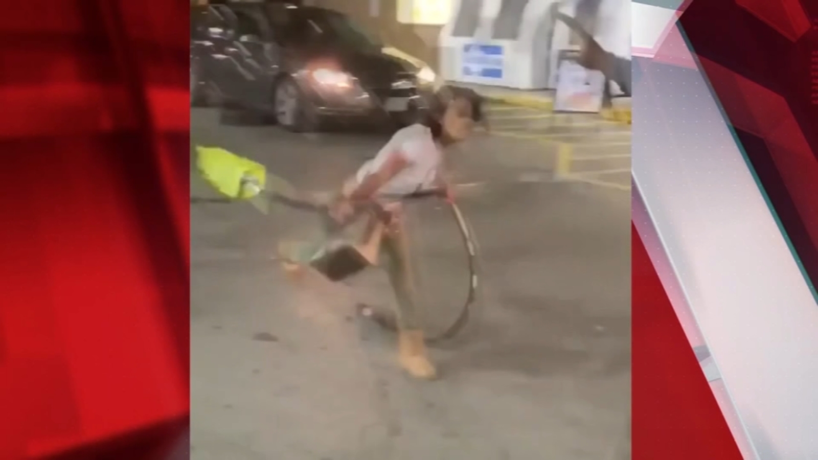Women spray gasoline and swing gas pump during wild gas station fight ...