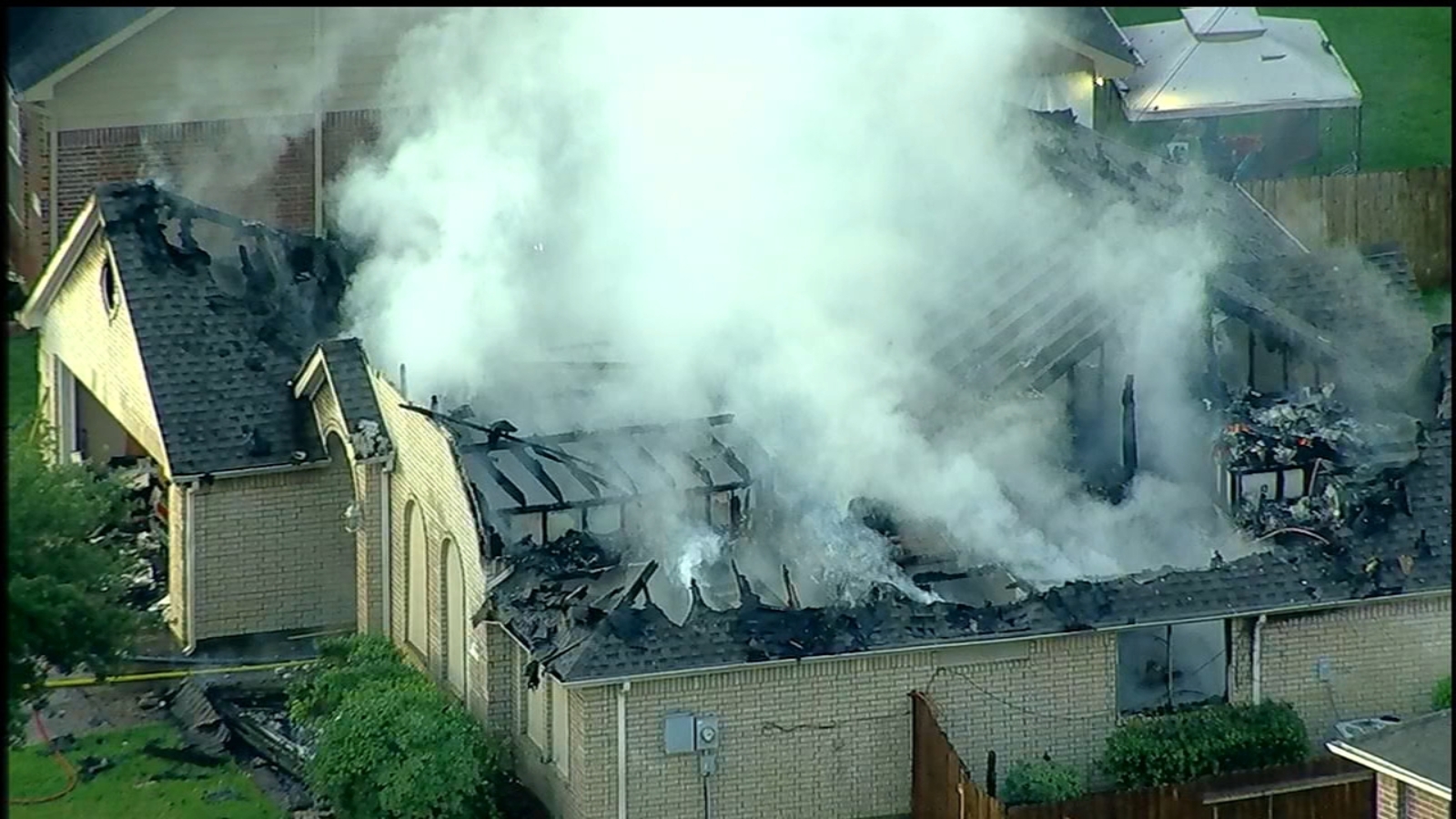 Roof of home destroyed in large house fire in northeast Harris County ...