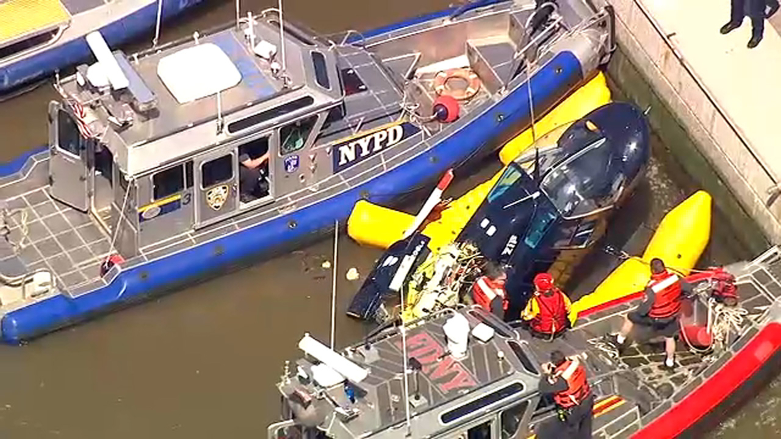 Helicopter crash lands in Hudson River near Manhattan's West Side ...