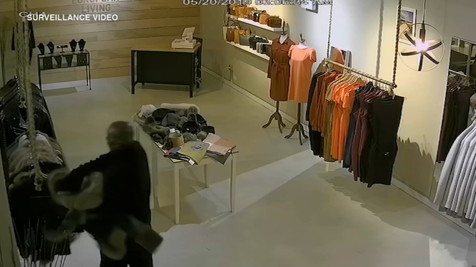 WATCH: Man steals leather jackets from NW Side store - ABC7 Chicago