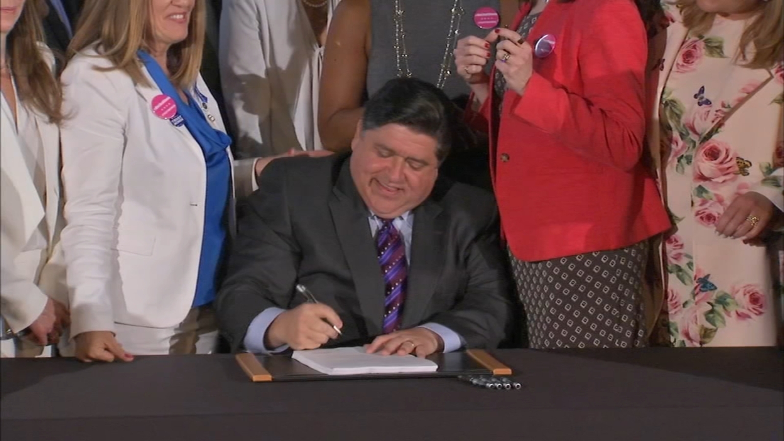 Governor JB Pritzker signs Reproductive Health Act, expanding Illinois abortion access - ABC7 ...