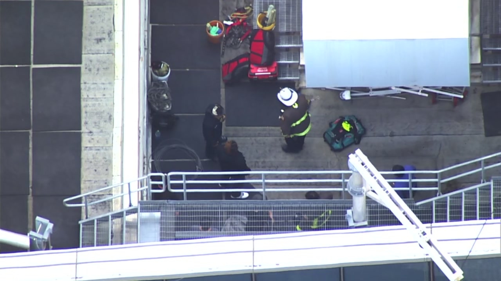 Firefighters rescue window washers stuck 10 stories on high-rise ...